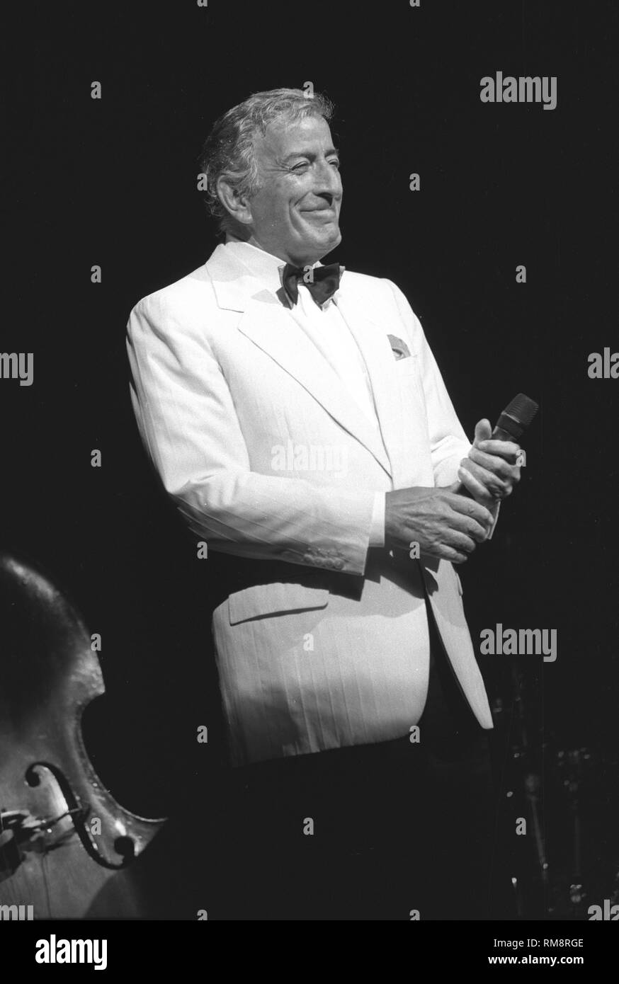 Singer Tony Bennett is shown performing on stage during a "live ...