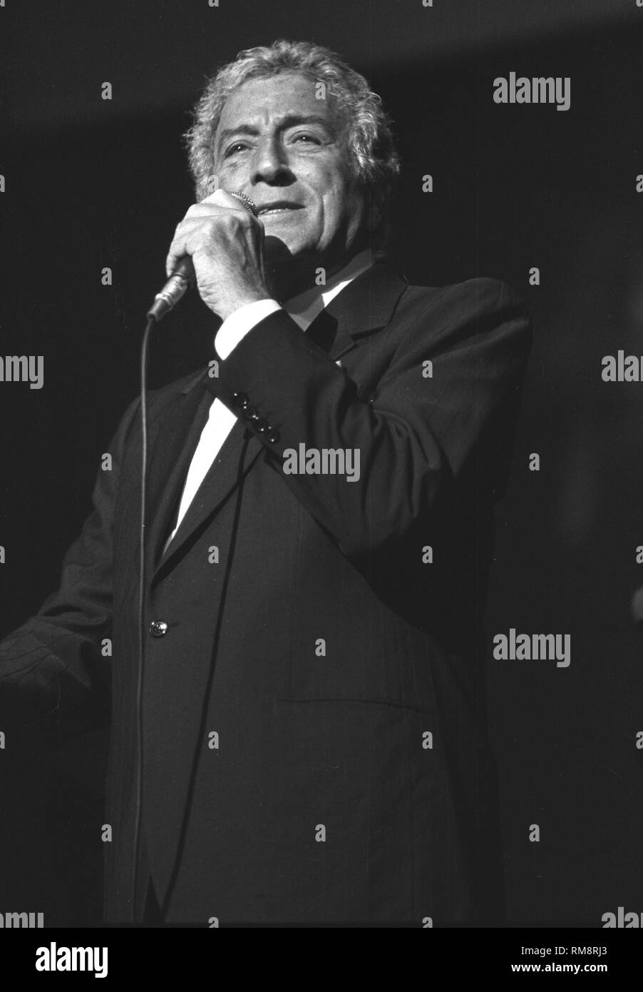 Singer Tony Bennett is shown performing on stage during a "live ...