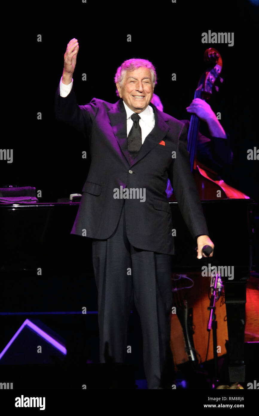 Singer Tony Bennett is shown performing on stage during a "live ...