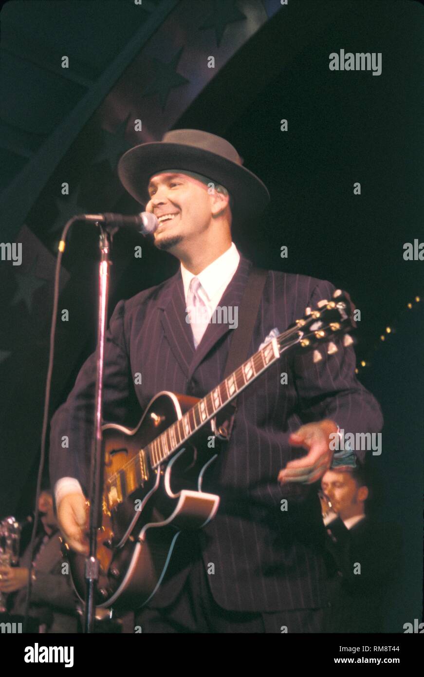 Big Bad Voodoo Daddy band members are shown performing during a "live ...