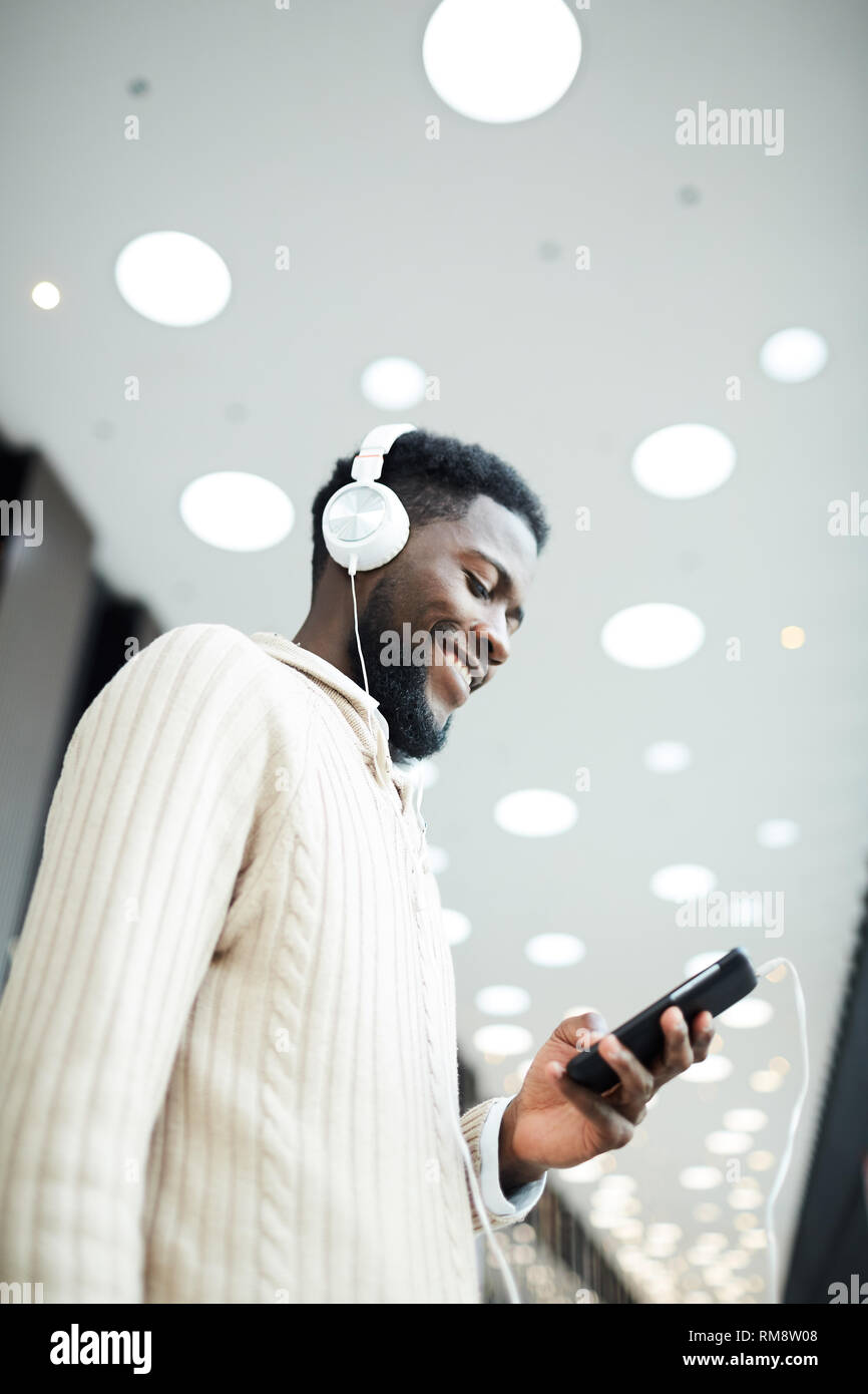 Guy enjoying music Stock Photo - Alamy