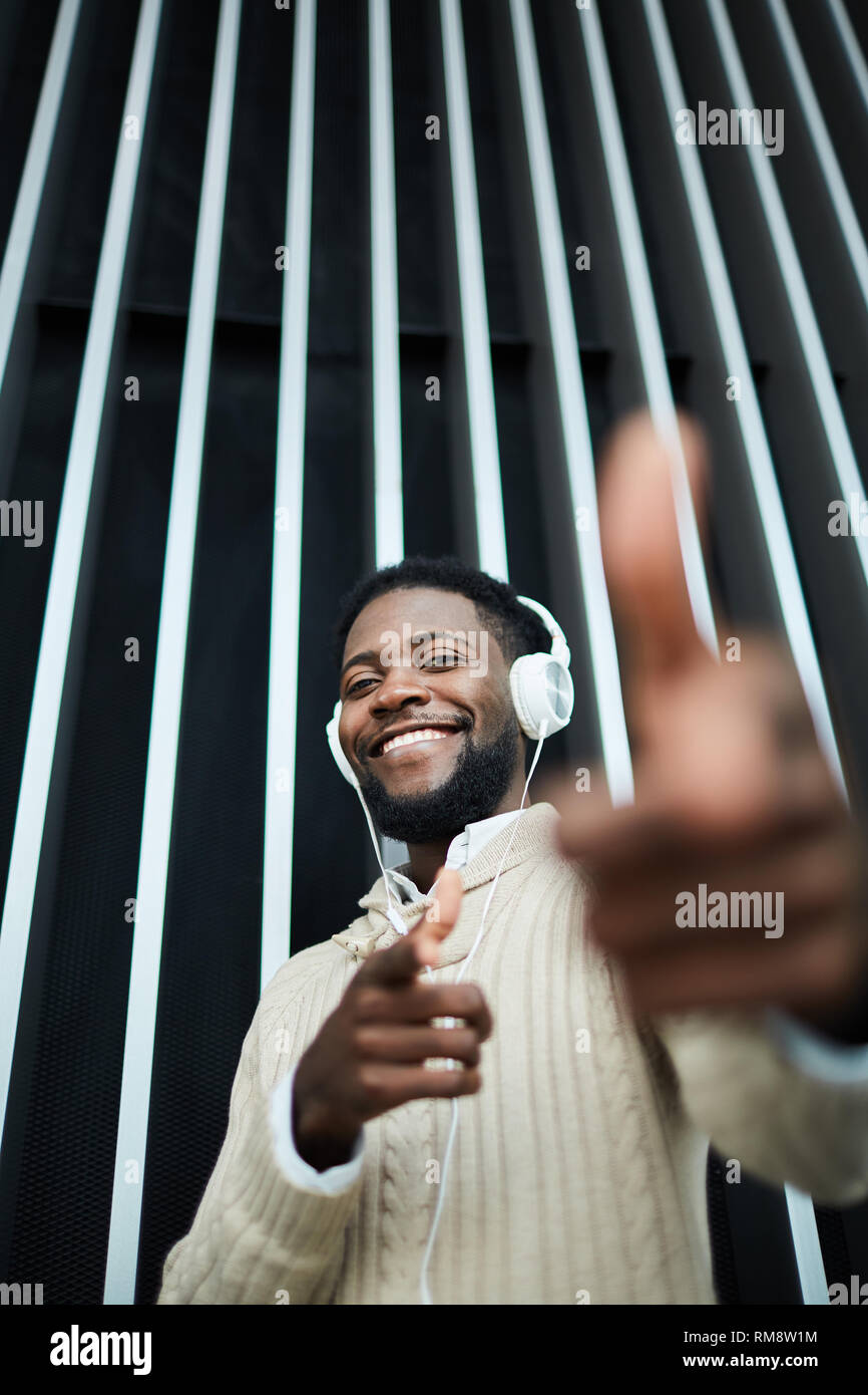 Handsome african american guy pointing hi-res stock photography and ...
