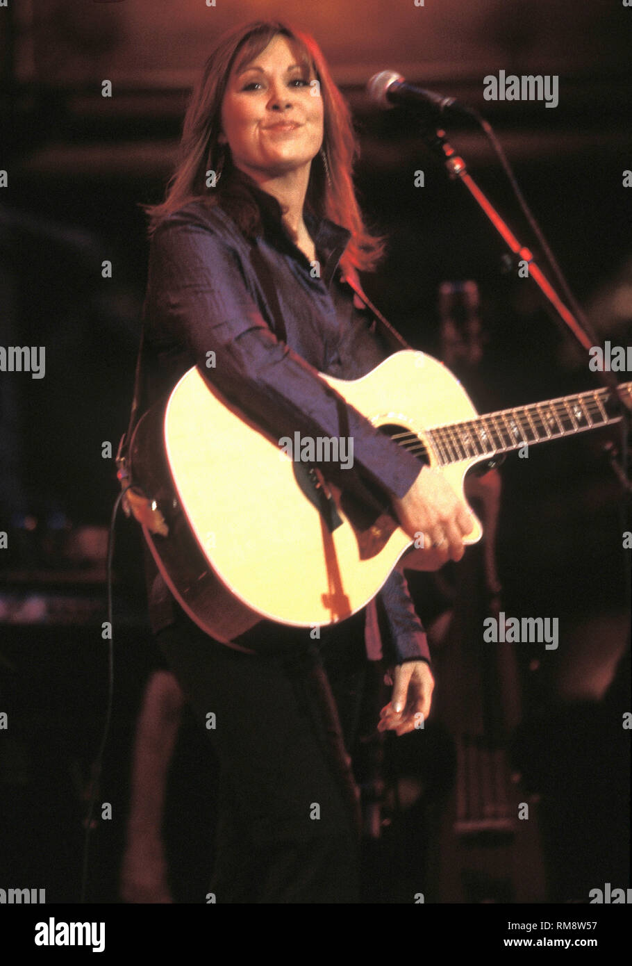 Musician Suzy Boggus is shown performing in concert for her fans Stock ...