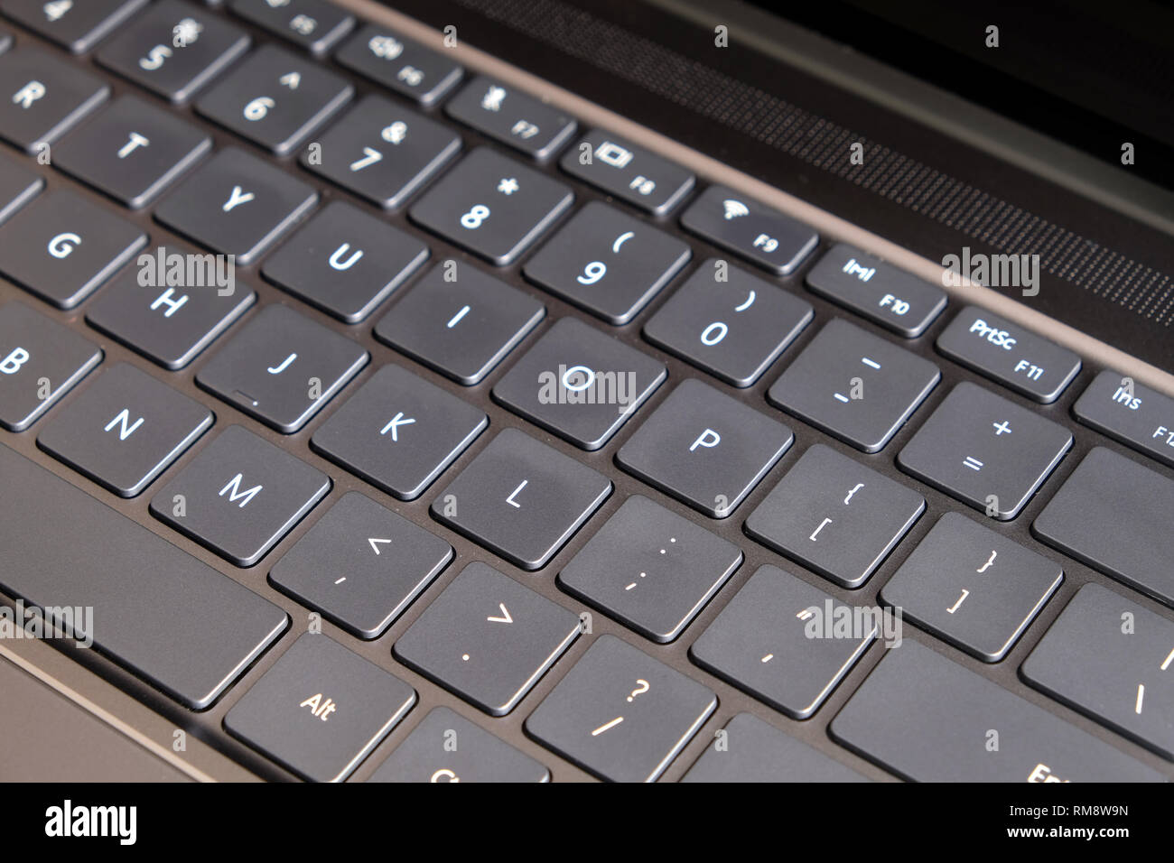 Opened laptop keyboard, touchpad and empty mirror screen of black ...