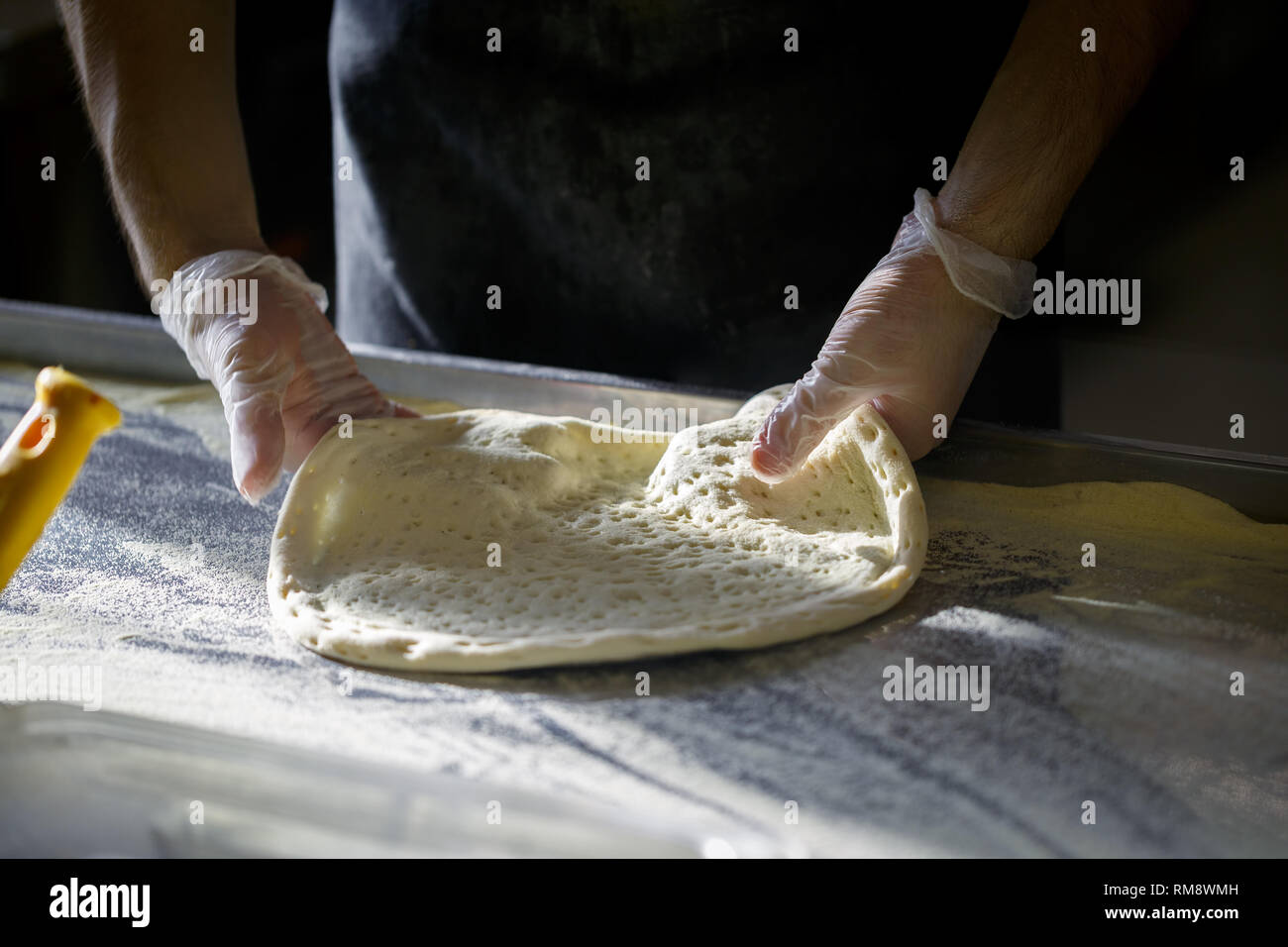 Pizza base production hi-res stock photography and images - Alamy