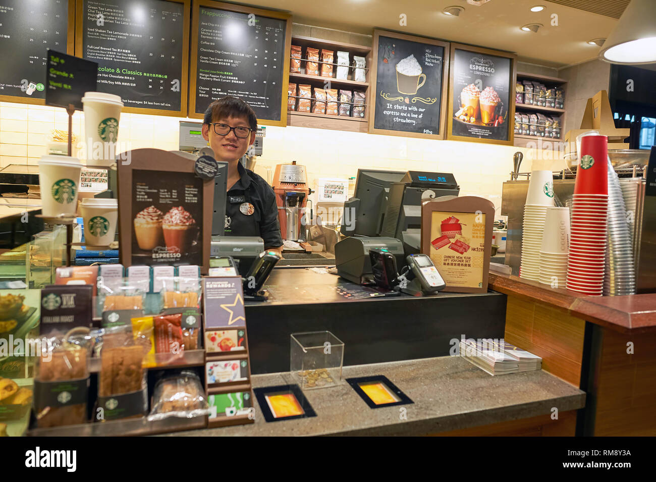 Starbucks worker beverage hi-res stock photography and images - Alamy