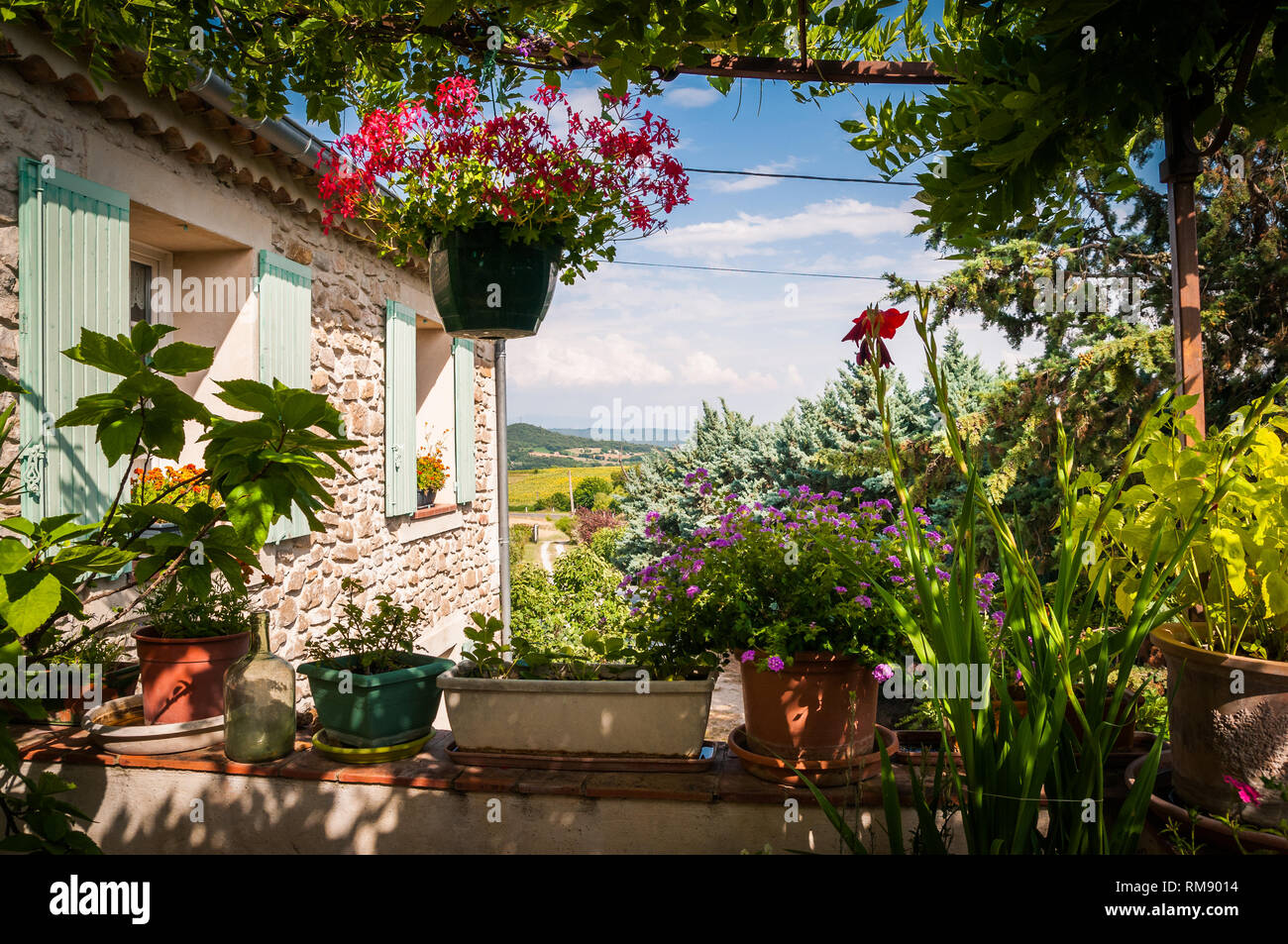 Provence: Panoramic terrace with flowers overlooking the field of ...