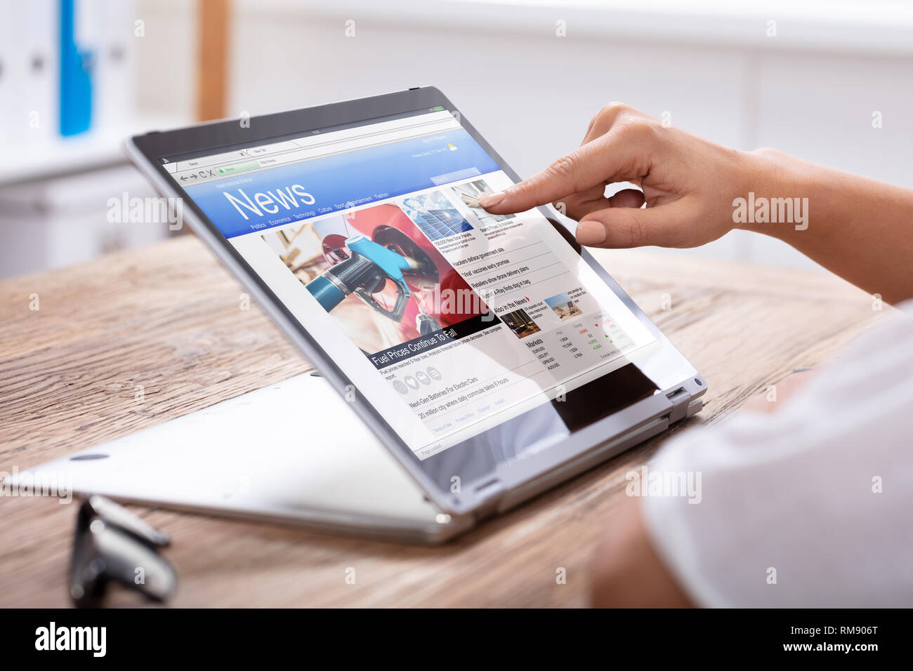 Finger pointing on digital hi-res stock photography and images - Alamy