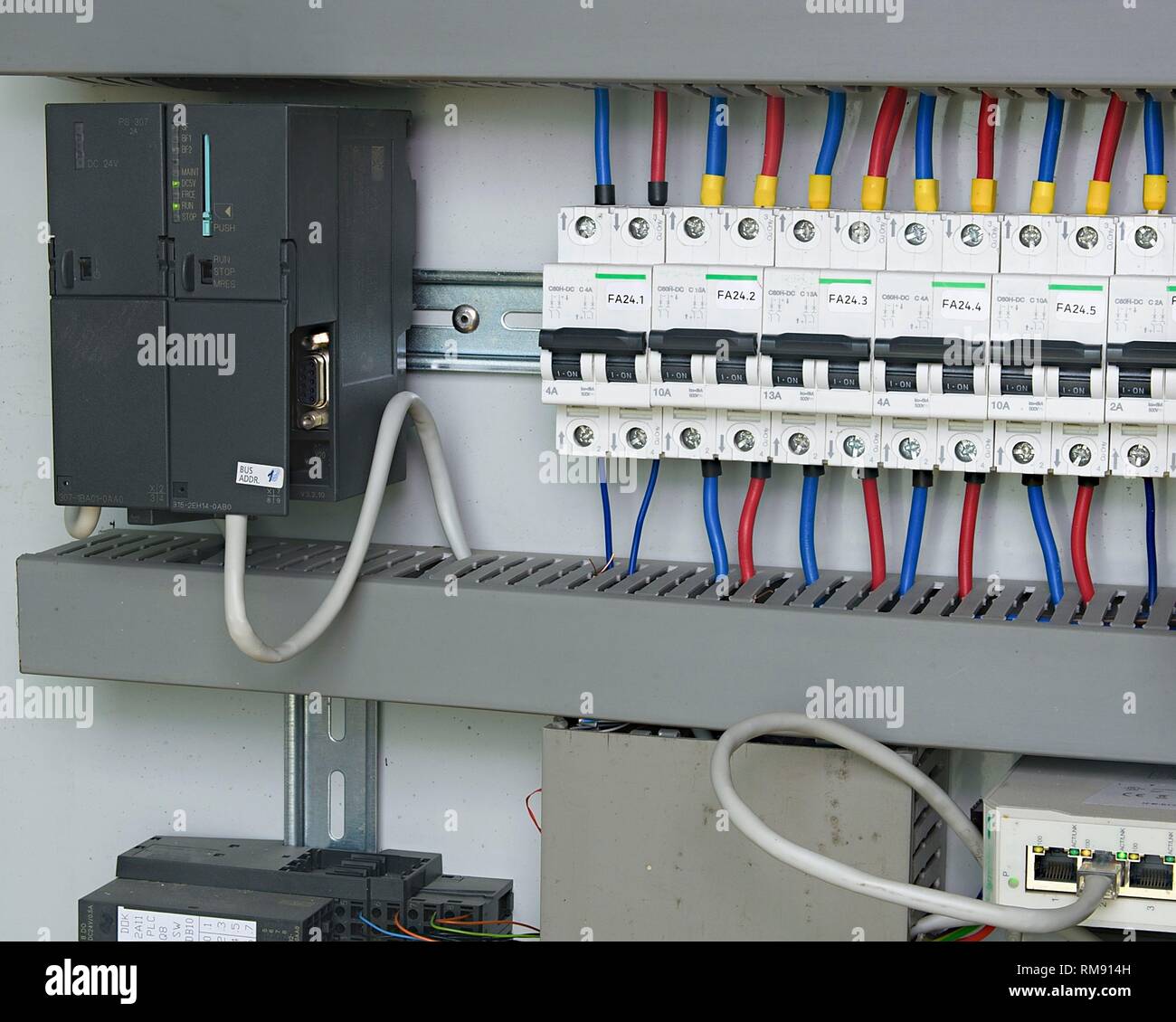 Image shows control cubicle. Electric device and circuit breakers ...