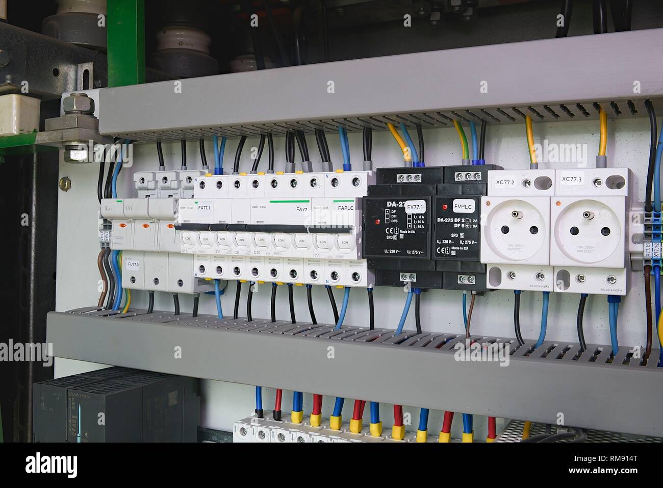 Image shows control cubicle. Electric device and circuit breakers ...