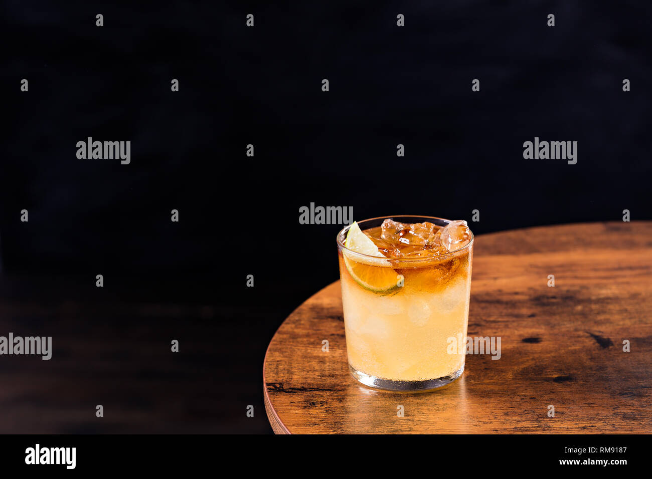 Refreshing Dark and Stormy Cocktail on a Table Stock Photo - Alamy