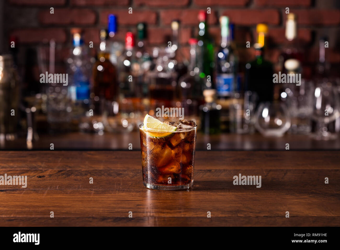 Refreshing Rum and Cola Cocktail on a Bar Stock Photo - Alamy