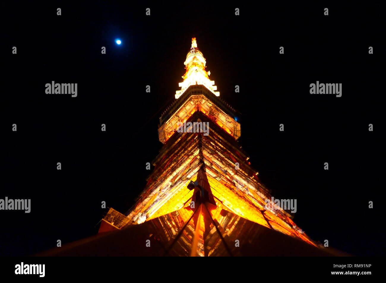 Tokyo Tower at night with a full moon In Minato, Tokyo, Japan Stock ...