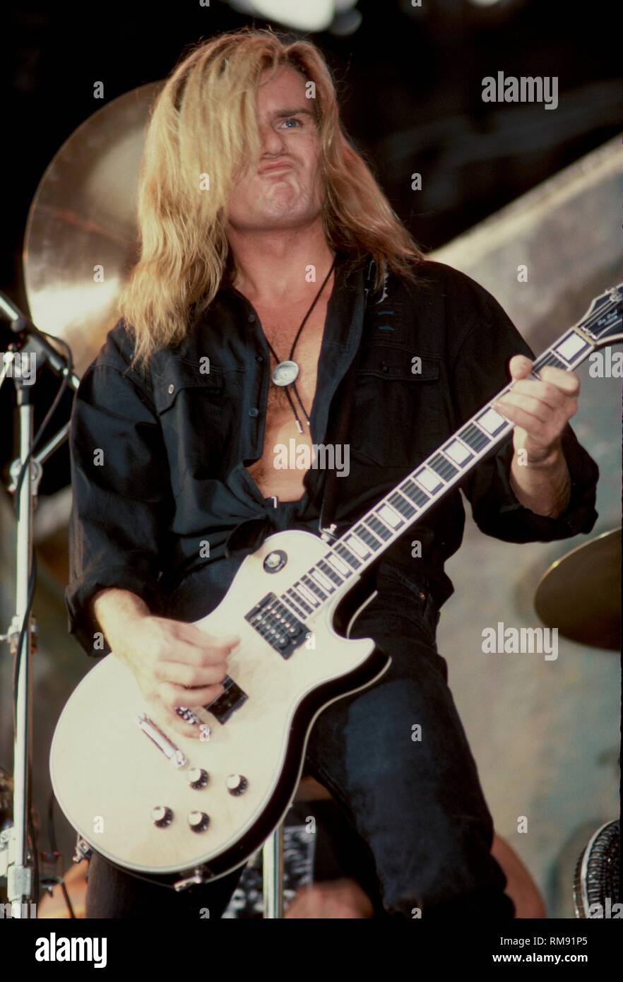 Guitarist Billy Duffy of The Cult is shown performing on stage during a ...