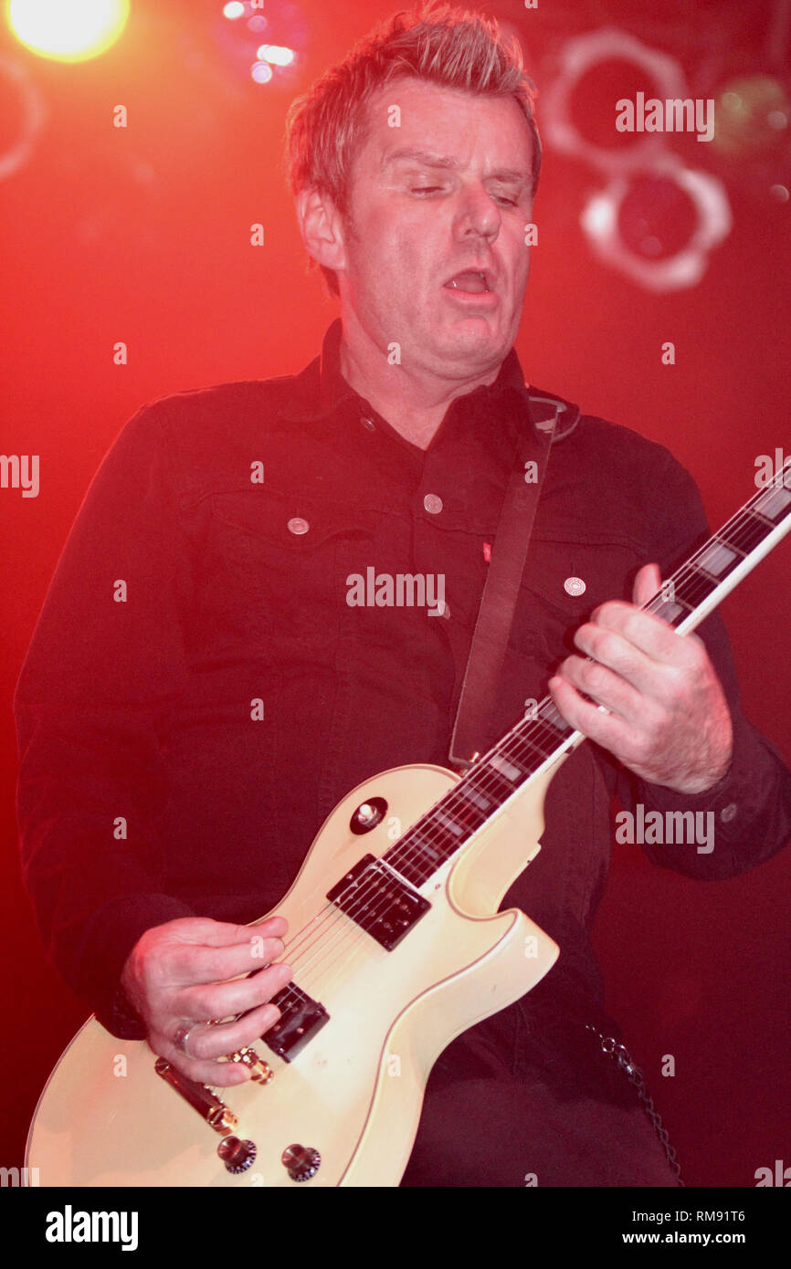 Guitarist Billy Duffy of The Cult is shown performing on stage during a ...