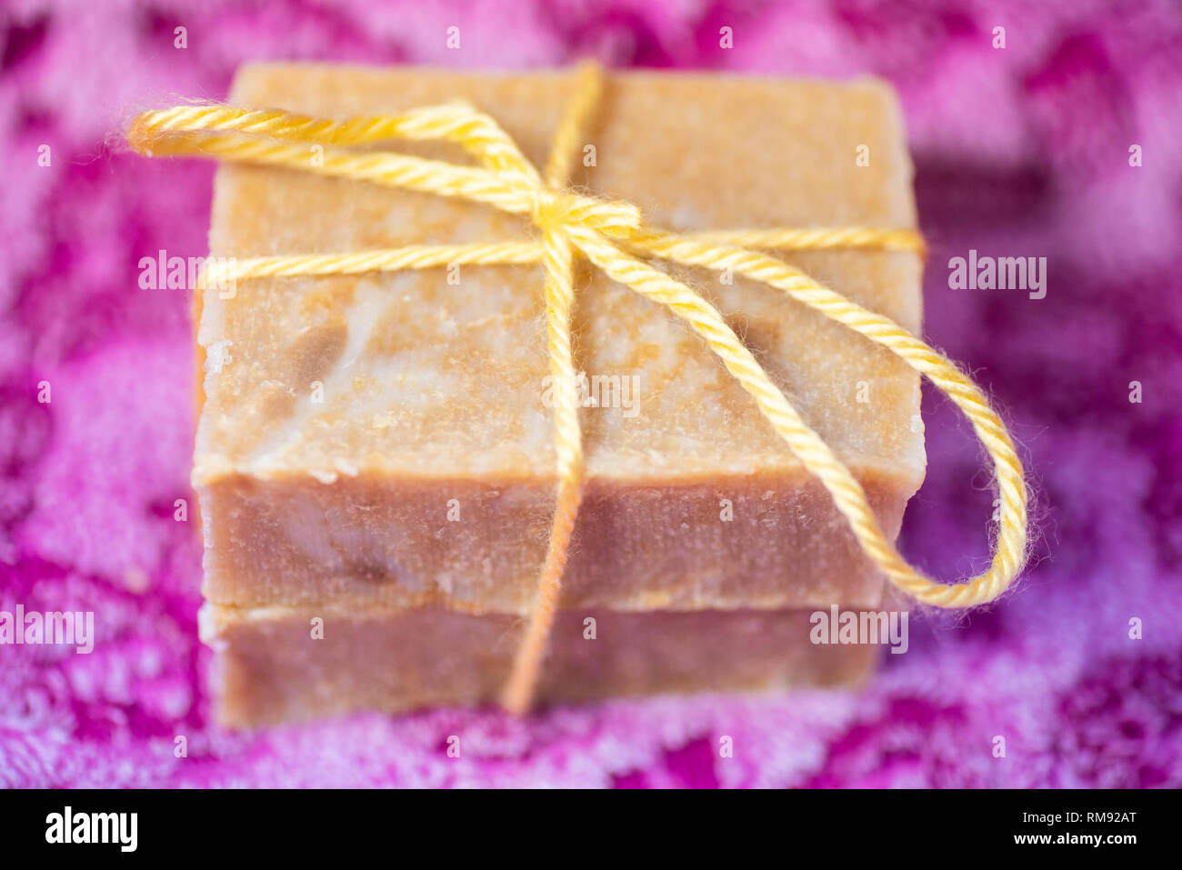 Two bars of handcrafted soap tied with a bow Stock Photo - Alamy