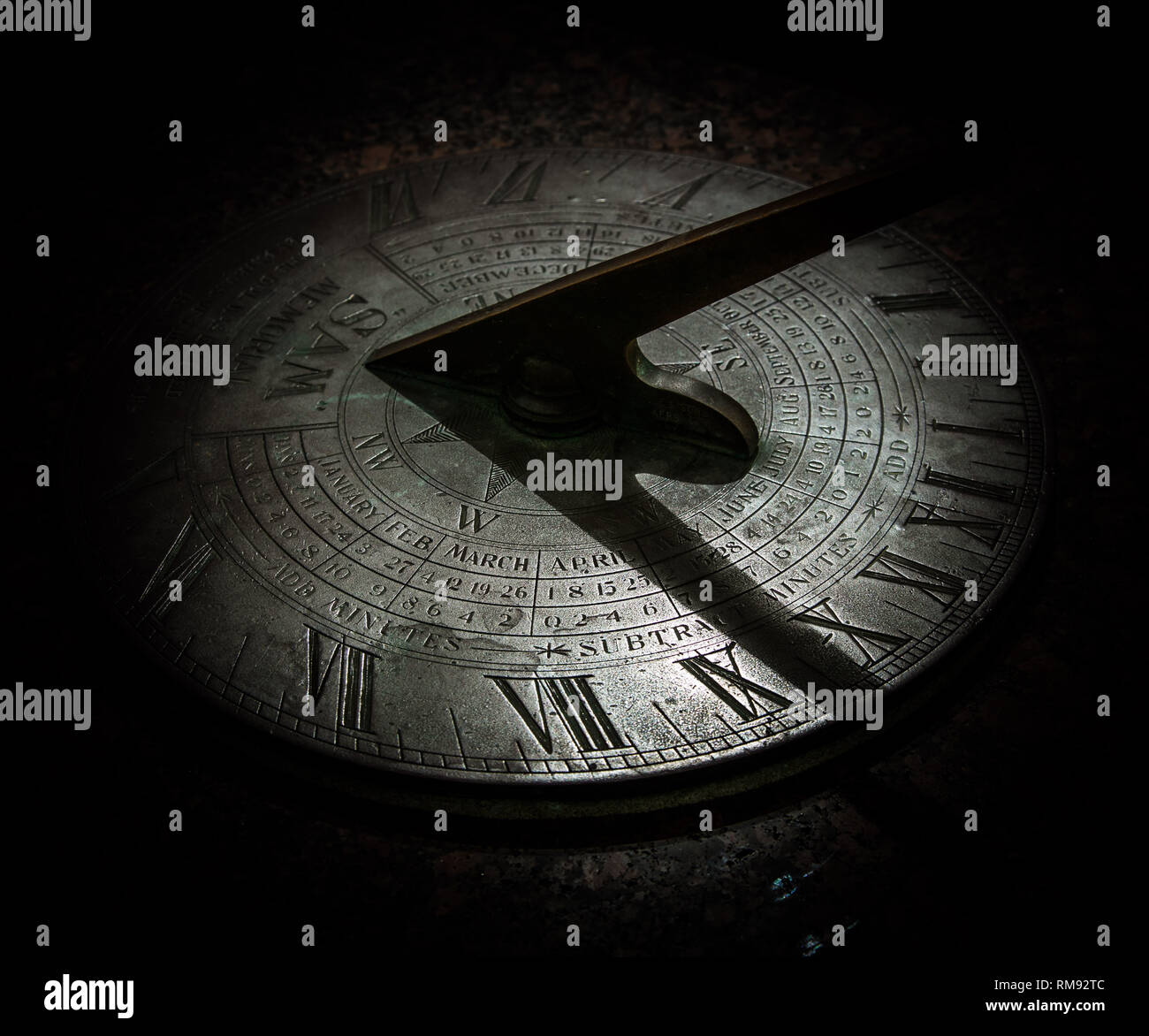 The sun casts a shadow on an antique sundial Stock Photo - Alamy