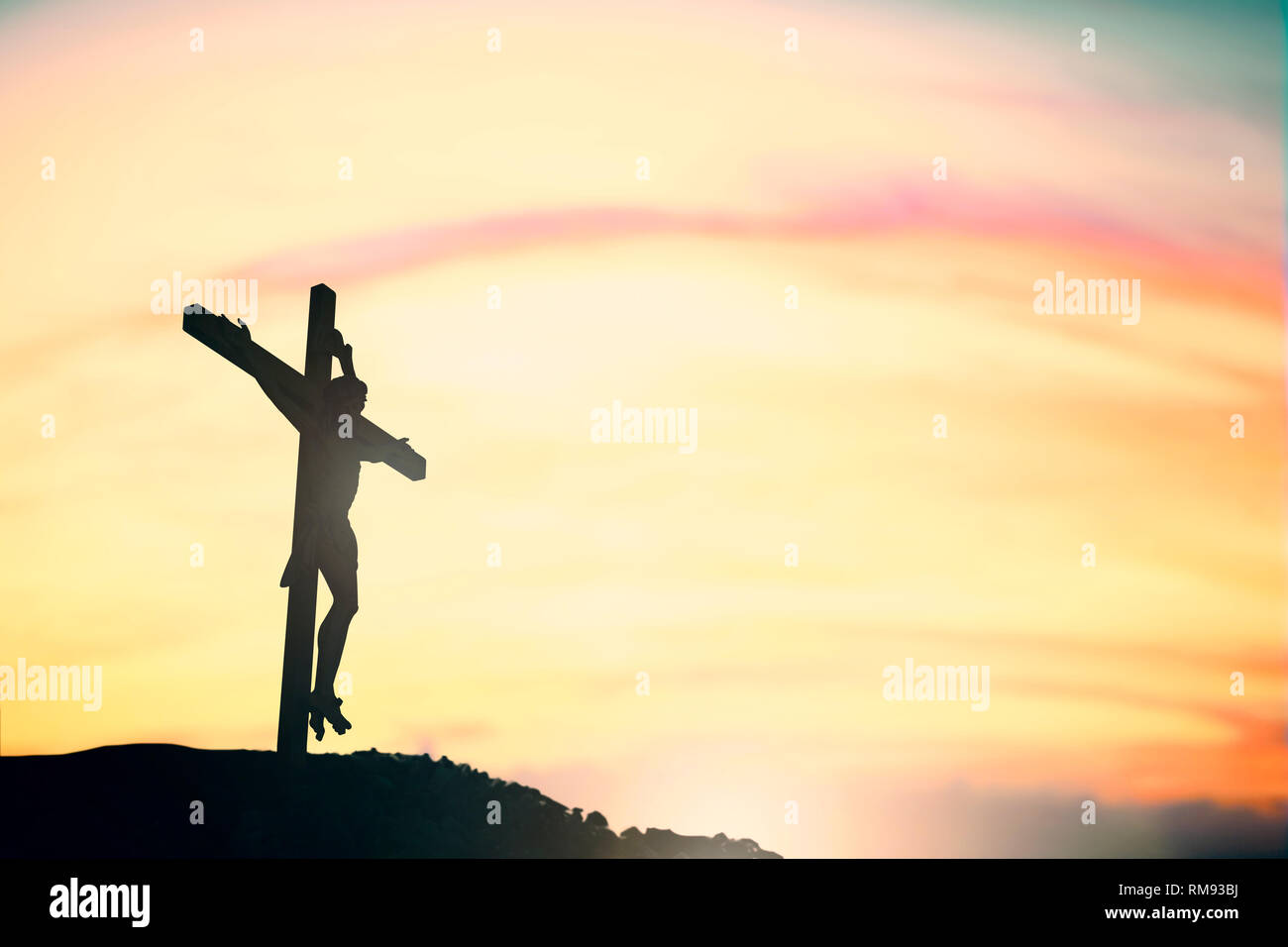 Silhouette of Jesus with Cross over sunset concept for religion ...