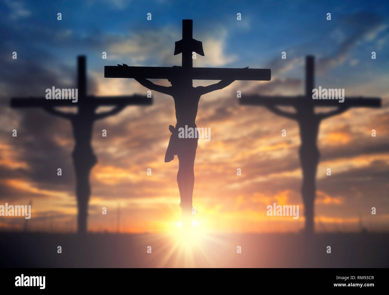 Silhouette of Jesus with Cross over sunset concept for religion ...