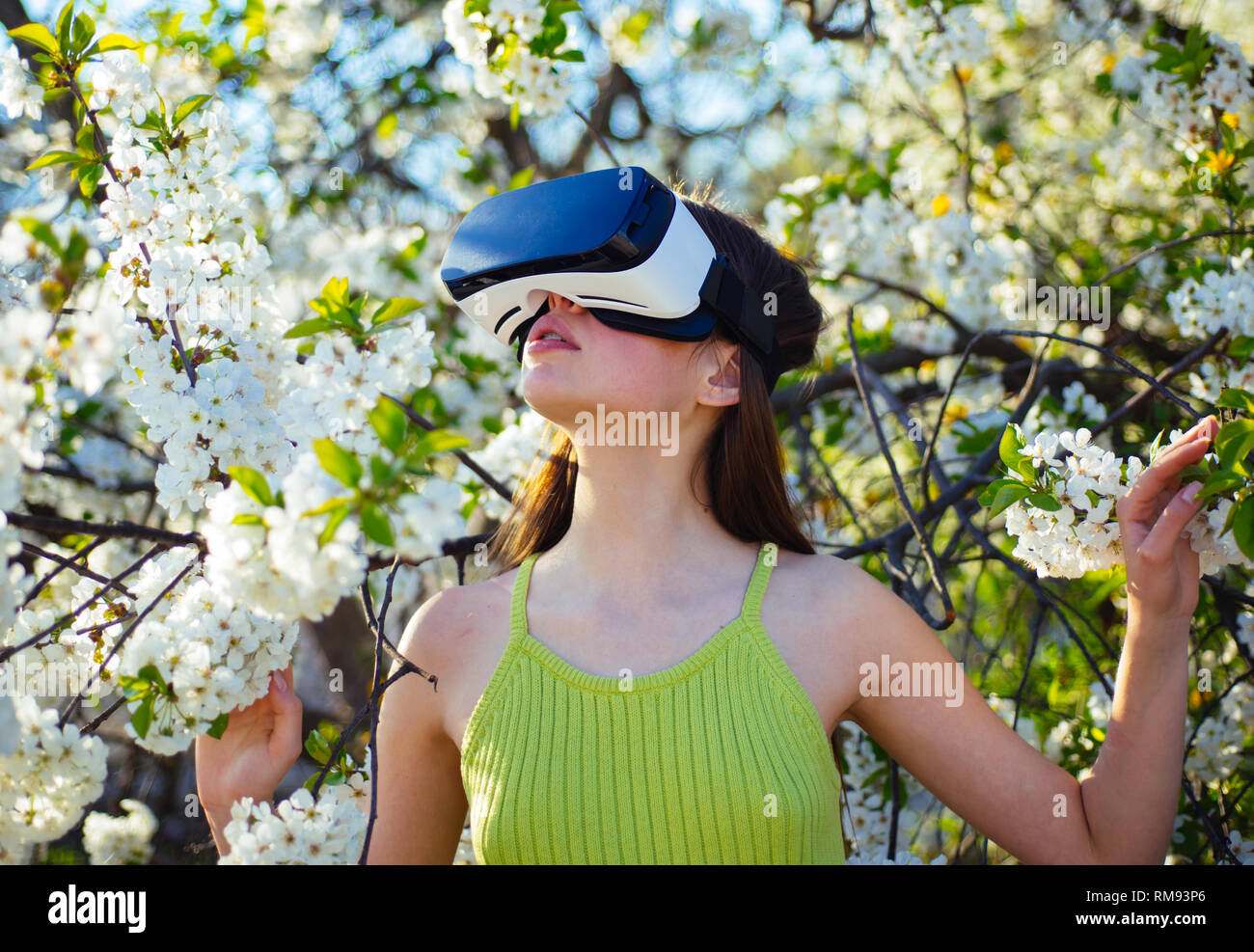 New experience. Virtual technology simulation. Pretty girl in virtual ...