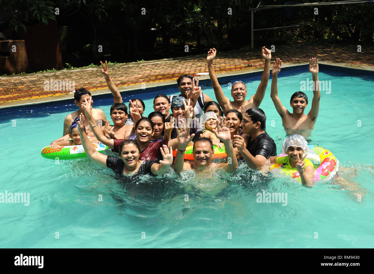 Indian man outdoor swimming pool hi-res stock photography and images ...