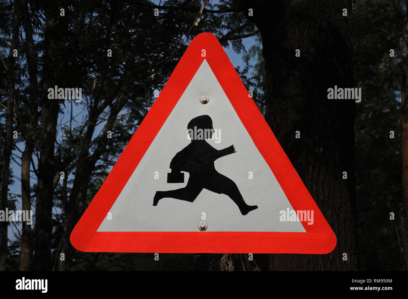 School crossing sign showing children hi-res stock photography and ...