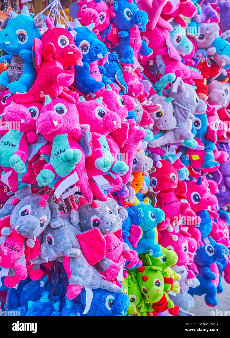 Variety of colorful plush dragons in the souvenir market stall in ...