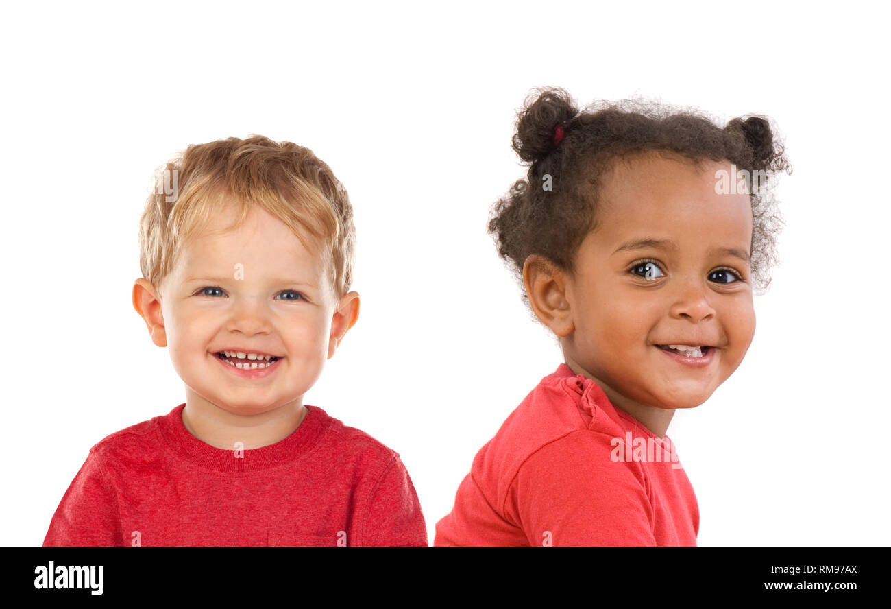 Two funny children looking at camera isolated on a white backround ...