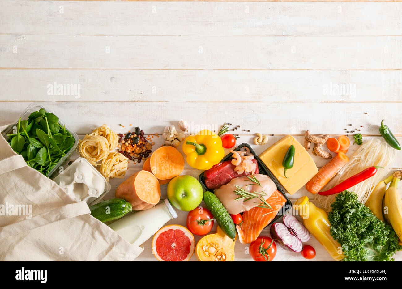 Balanced diet concept - fresh meat, fish, pasta, fruits and vegetables ...