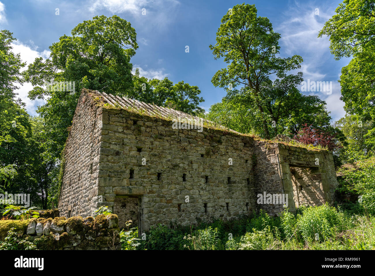 Linton, North Yorkshire, England, UK - June 05, 2018: An old stone barn ...