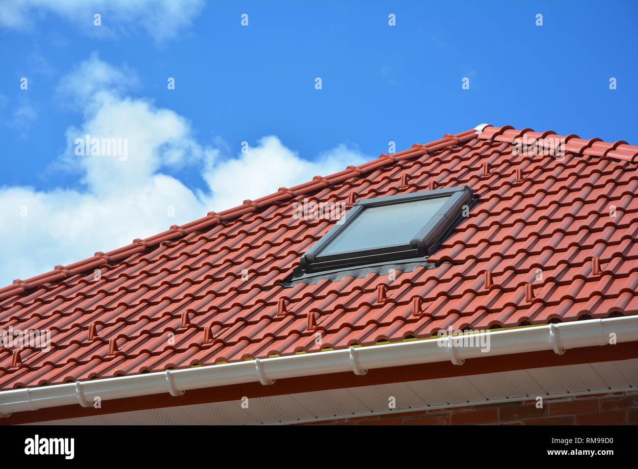 Attic skylight. Roof Tiles House Roofing Construction with Attic Roof ...