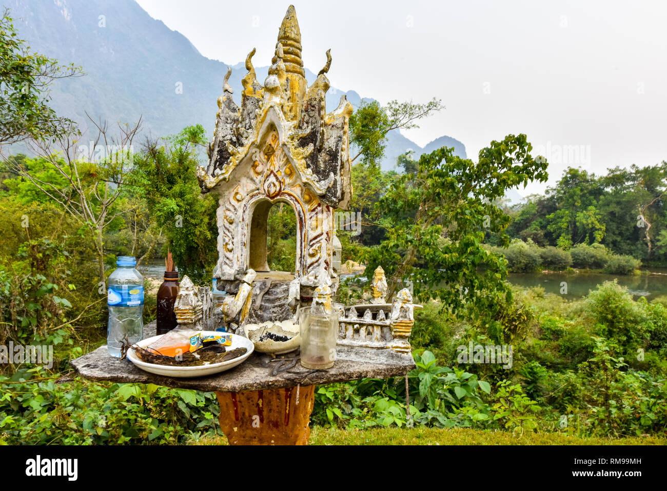Buddhist spirit house that is a shrine to the protective spirit of a ...