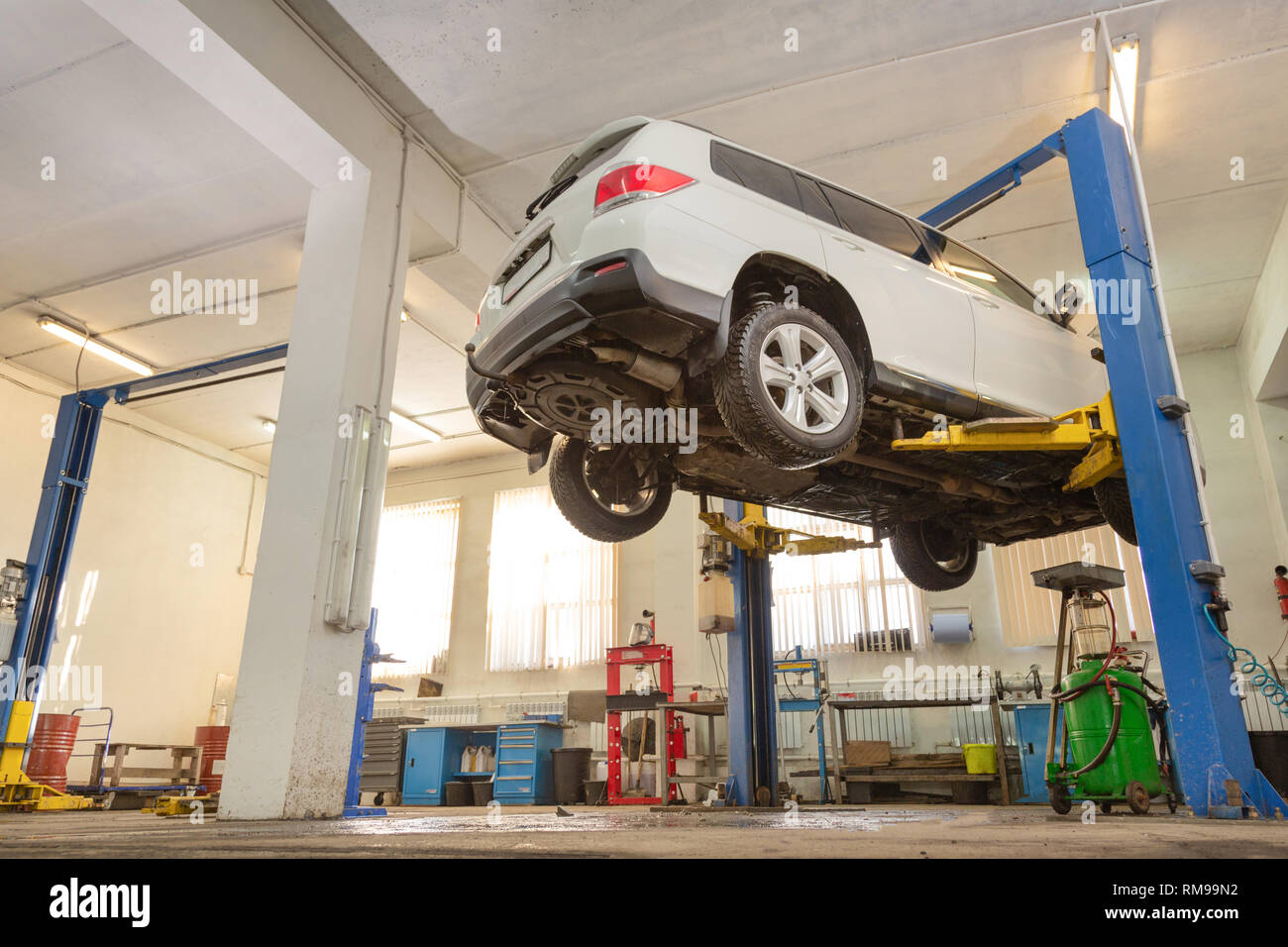 Car in service center Stock Photo - Alamy