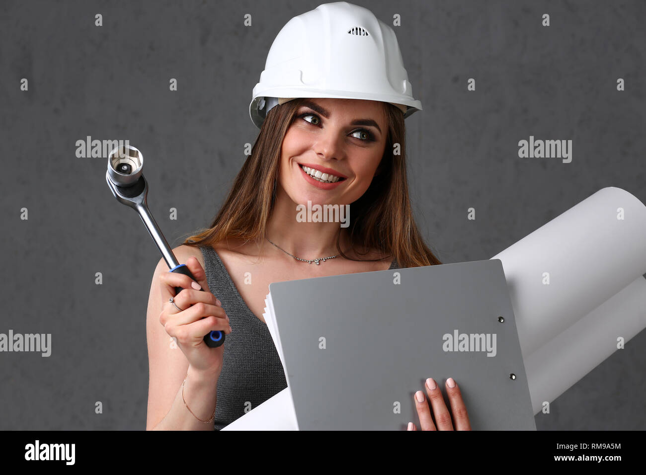 Young beautiful brunette girl wearing white helmet Stock Photo - Alamy Young beautiful brunette girl wearing white helmet Stock Photo - Alamy