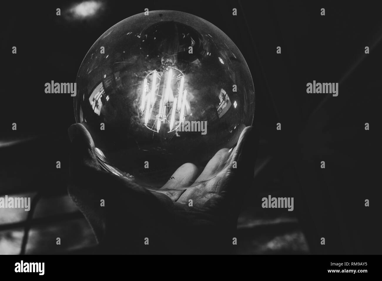 Crystal ball hands Black and White Stock Photos & Images - Alamy