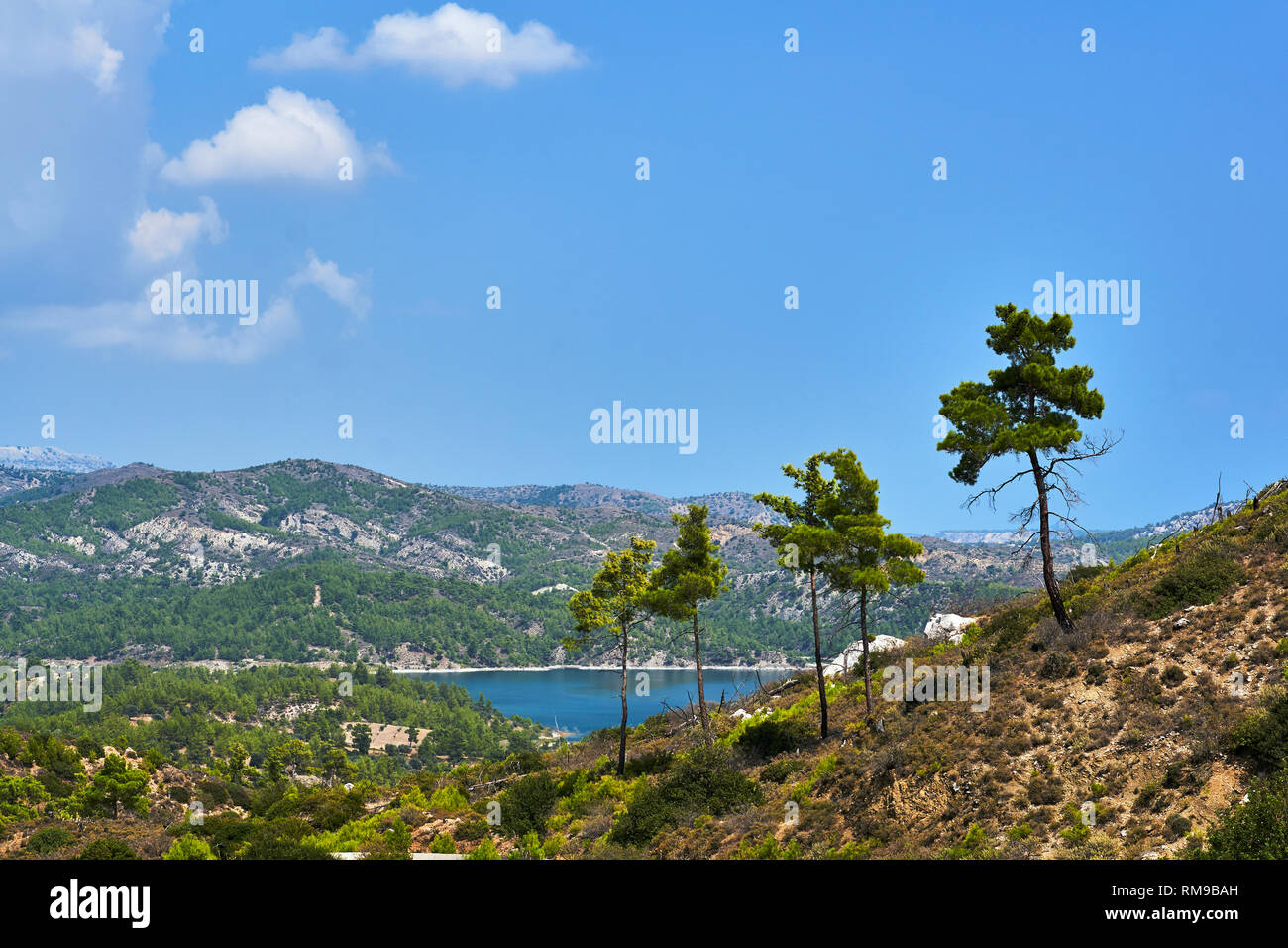 mountain landscape with a view of the reservoir on the island of Rhodes ...