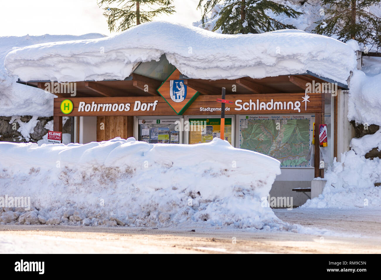 Austrian bus stop, sign ski region Schladming-Dachstein, Dachstein ...