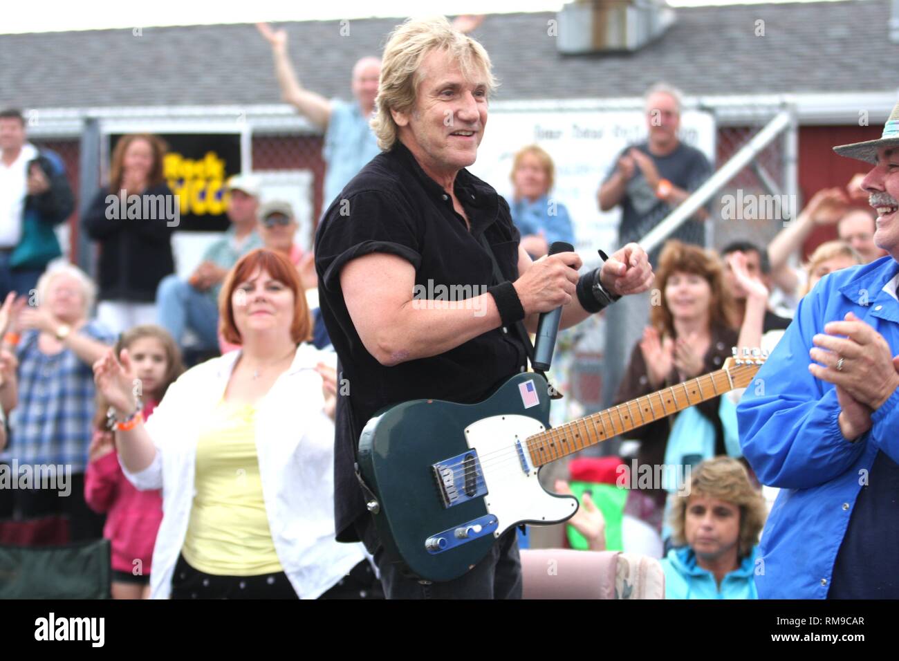 Singer, songwriter & guitarist John Cafferty is shown out in the crowd ...