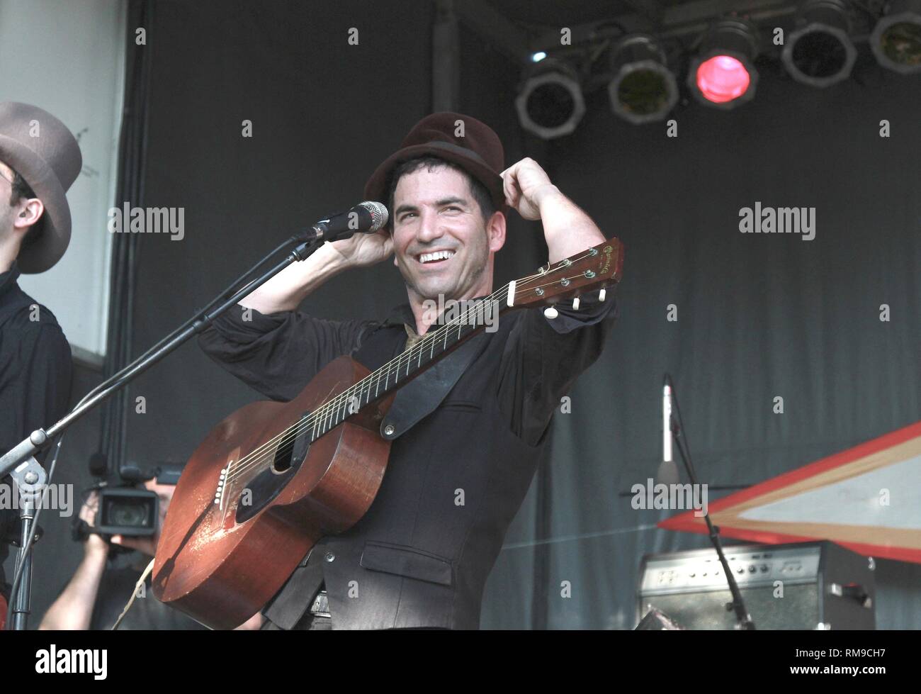 Singer, songwriter and guitarist Fuzz is shown performing on stage ...