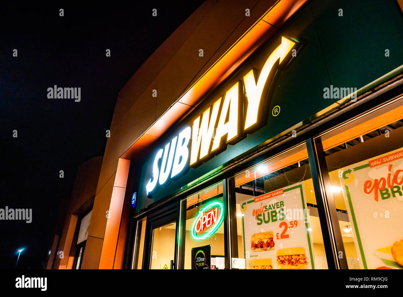 Shop Front of Subway open at night. The illuminate sign of Subway a ...