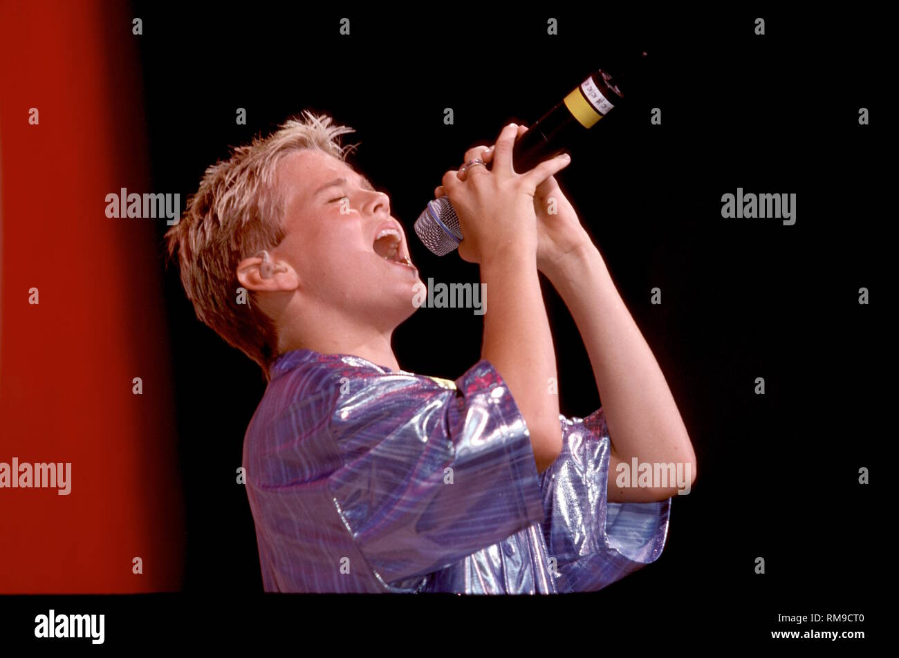 A young Aaron Carter is shown performing on stage during a "live ...