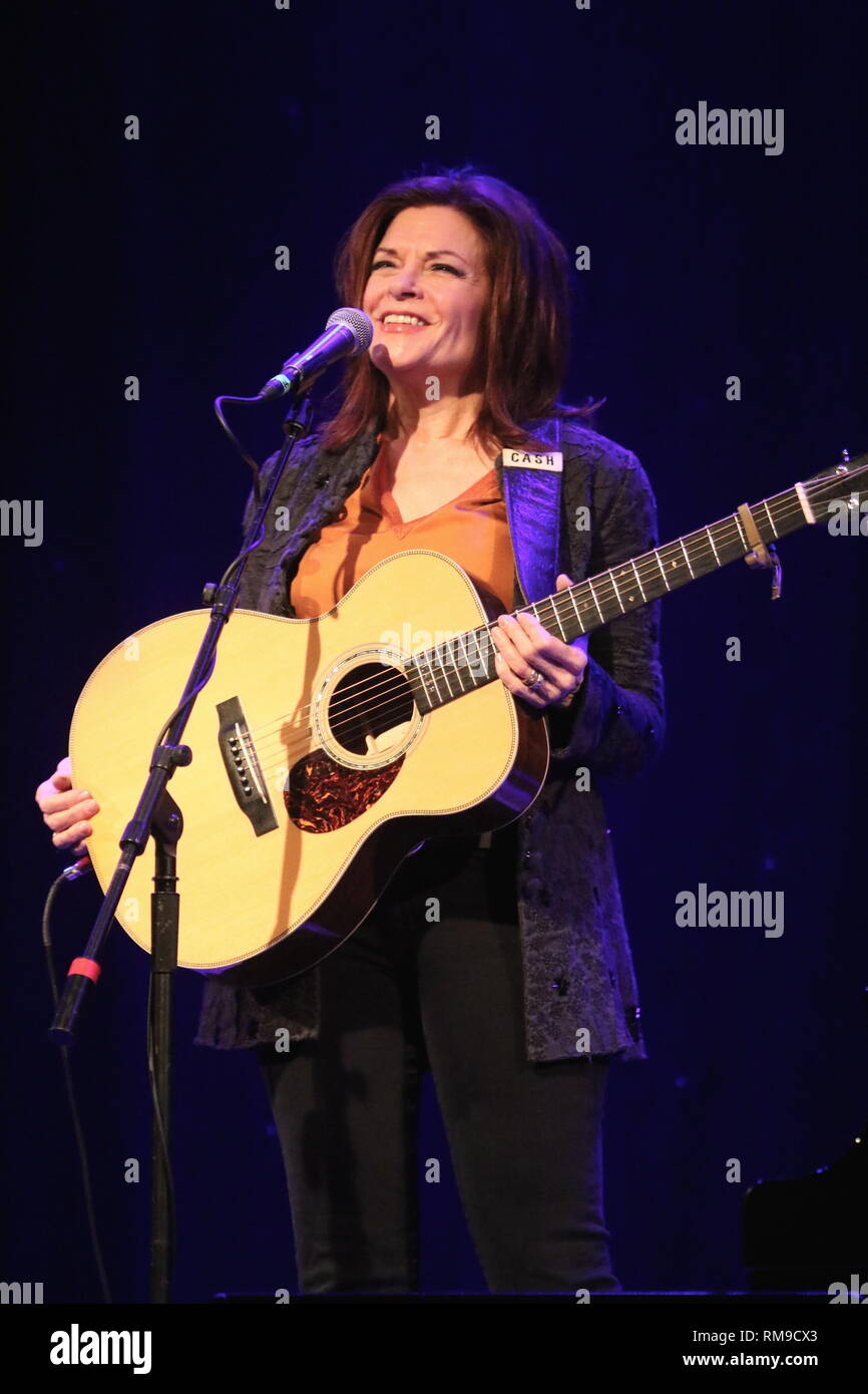 Musician Rosanne Cash is shown performing on stage during a "live ...