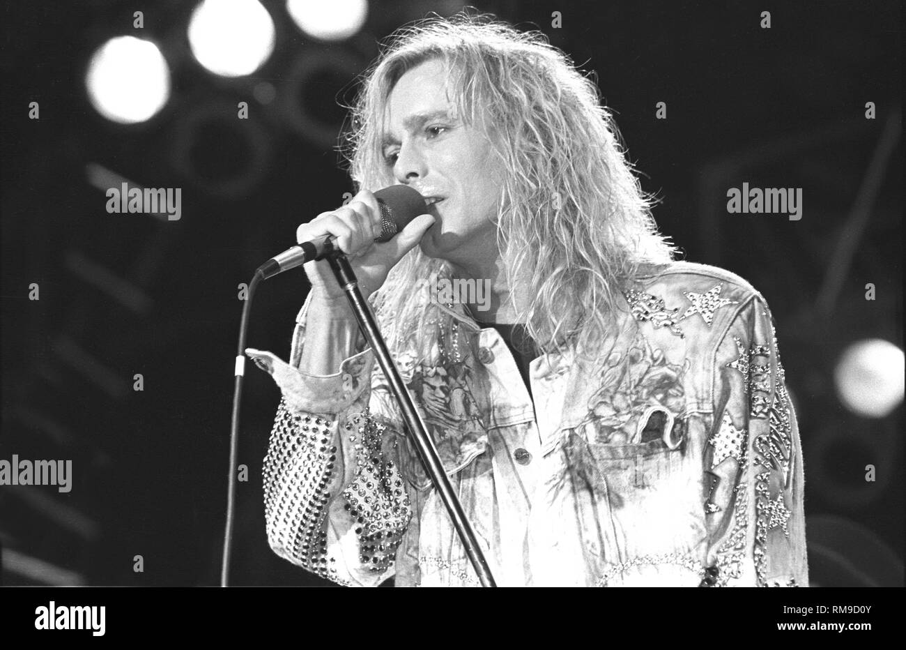 Cheap Trick guitarist Robin Zander is shown peforming on stage during a ...