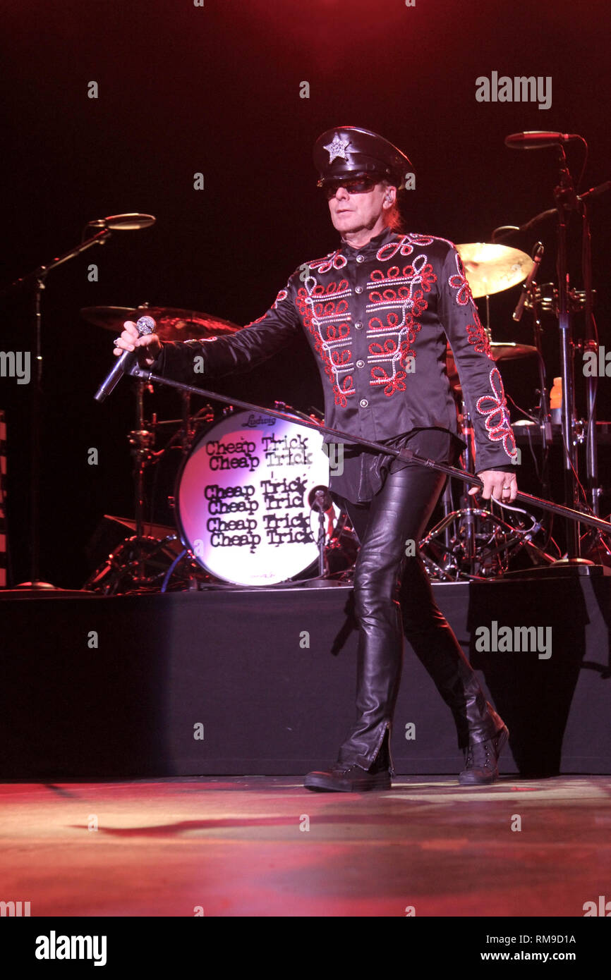 Singer Robin Zander is shown performing on stage during a "live ...