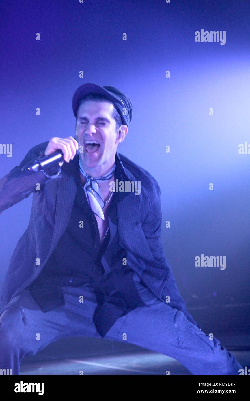 Singer Perry Farrell is shown performing on stage during a "live ...