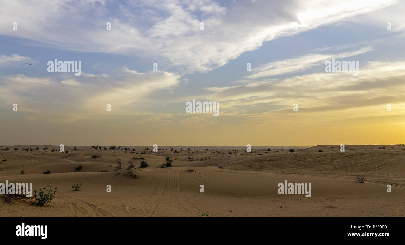 Colorful sunset in Dubai Desert (UAE). Dubai Desert is a scenic ...
