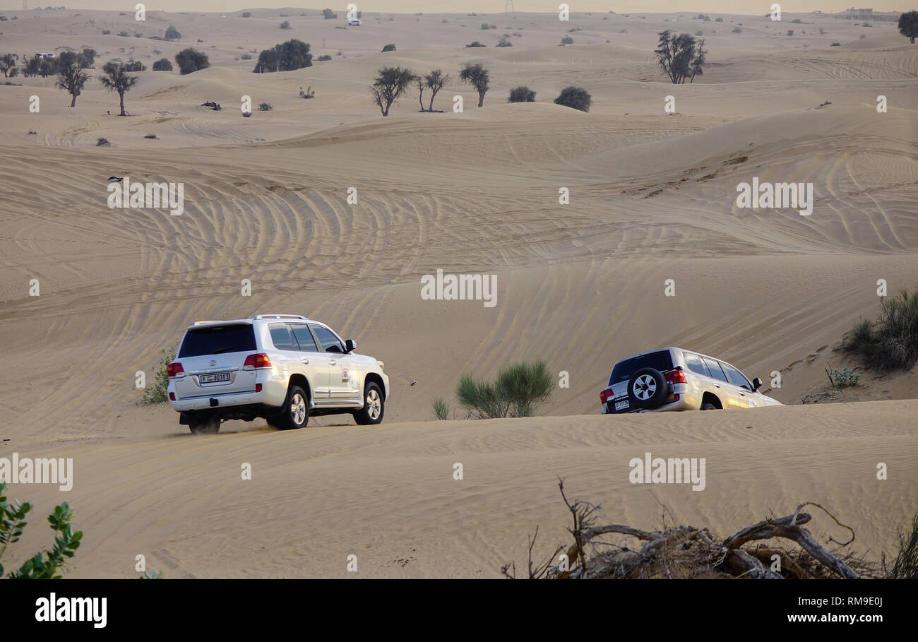 Dubai, UAE - Dec 5, 2018. SUV car (4x4) on Dubai desert. Driving in the ...