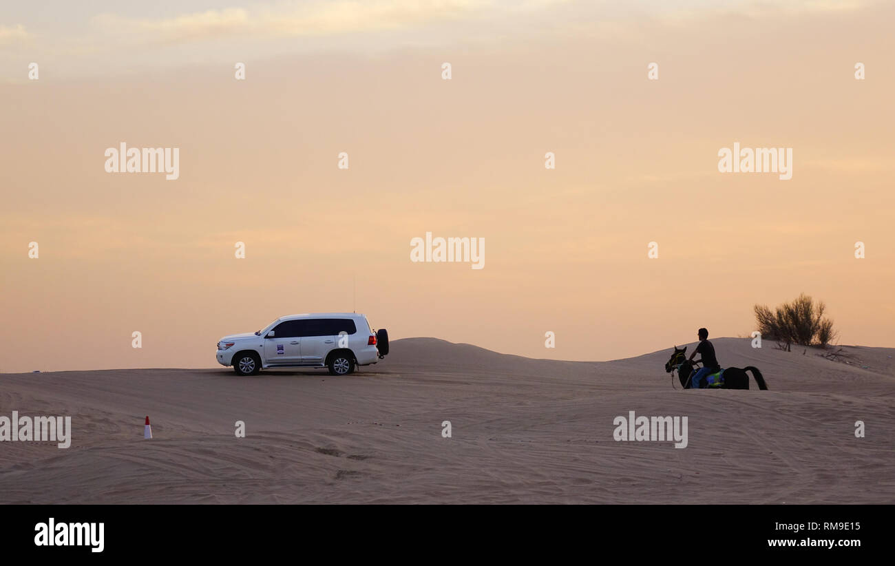 Dubai, UAE - Dec 5, 2018. SUV car (4x4) on Dubai desert. Driving in the ...