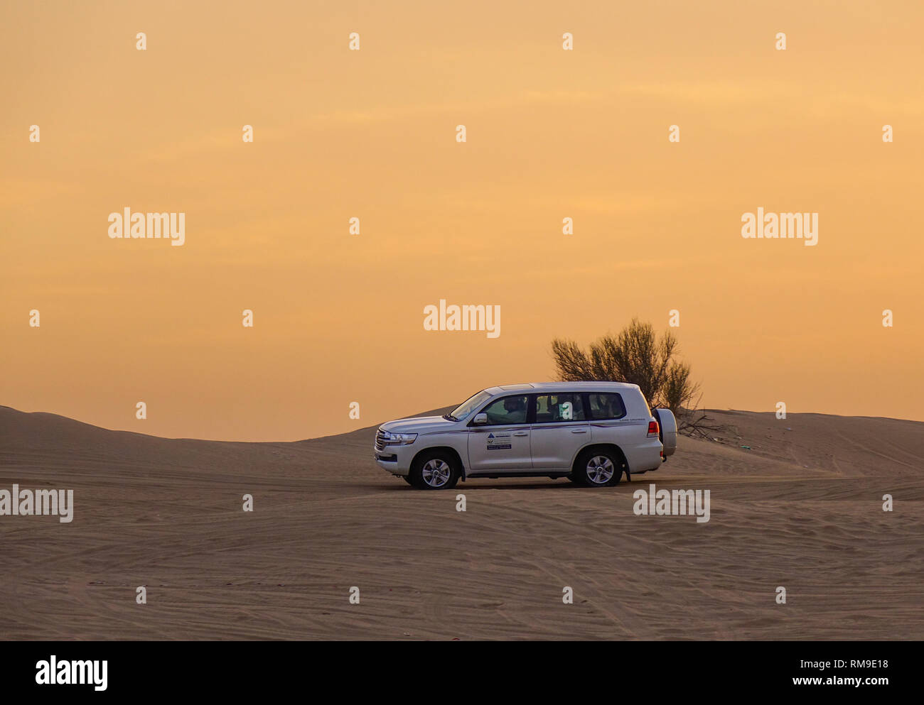 Dubai, UAE - Dec 5, 2018. SUV car (4x4) on Dubai desert. Driving in the ...