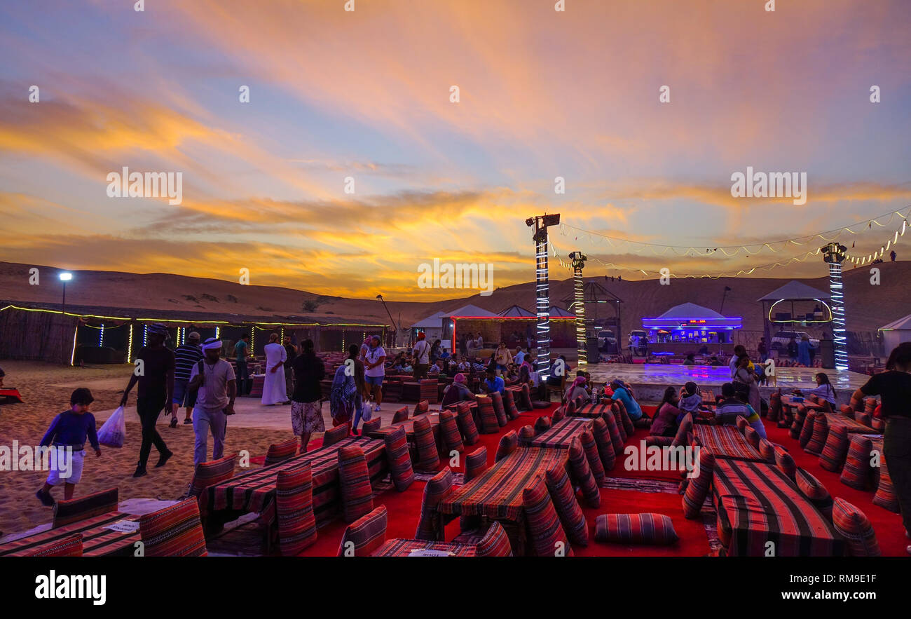 Dubai, UAE - Dec 5, 2018. Bedouin camp on the Dubai desert at sunset ...